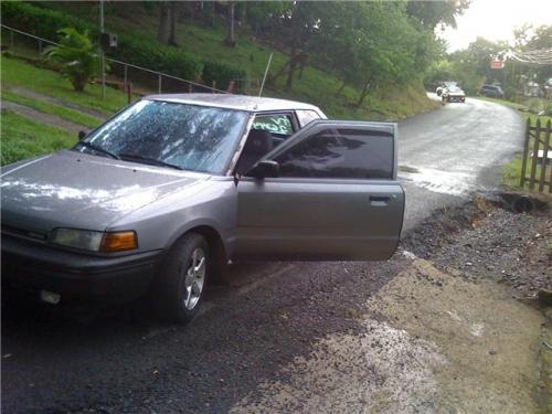 Mazda 323, año 91, full extras, o cambio por auto mayor precio en ...