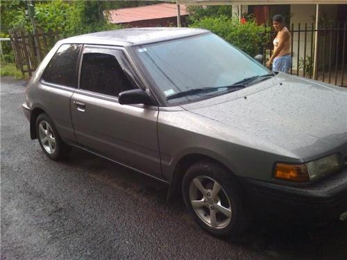 Mazda 323, año 91, full extras, o cambio por auto mayor precio en ...